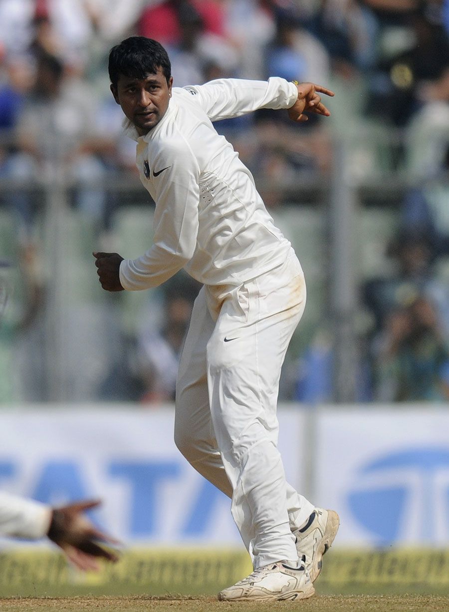Pragyan Ojha in his delivery stride | ESPNcricinfo.com