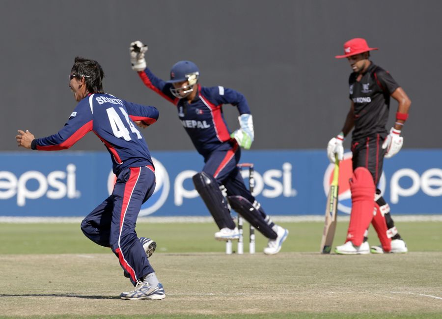 Shakti Gauchan of Nepal leads the celebrations of a wicket during the ...