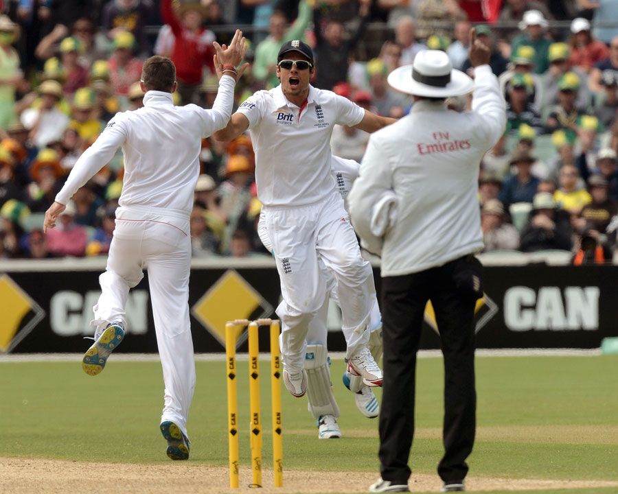 Alastair Cook and Graeme Swann celebrate Chris Rogers's dismissal ...
