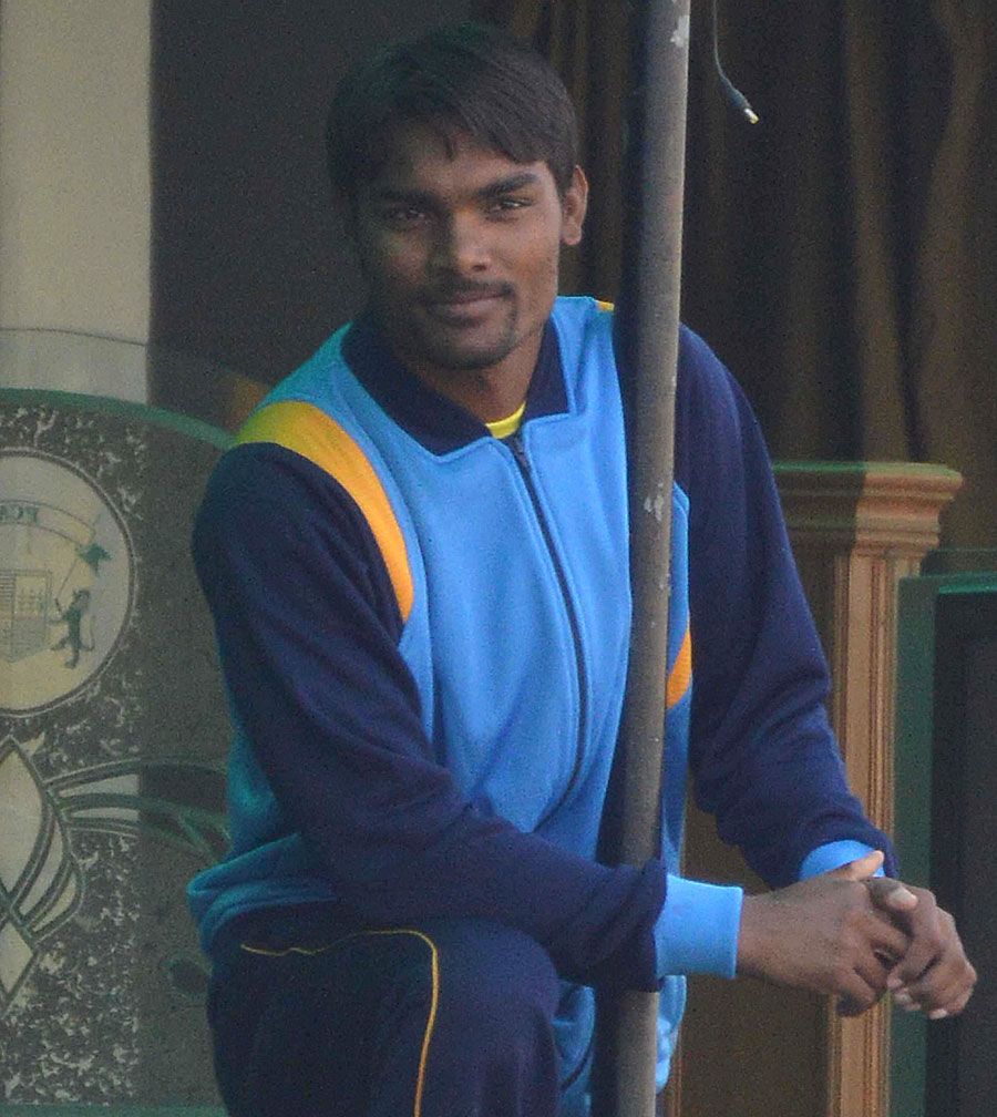 Sandeep Sharma relaxes in the dressing room after his five-wicket haul ...