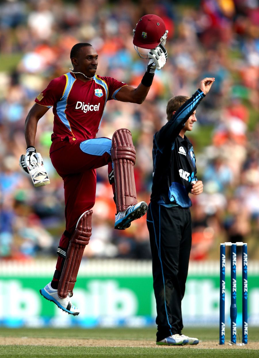 Dwayne Bravo leaps in celebration of his second ODI hundred ...