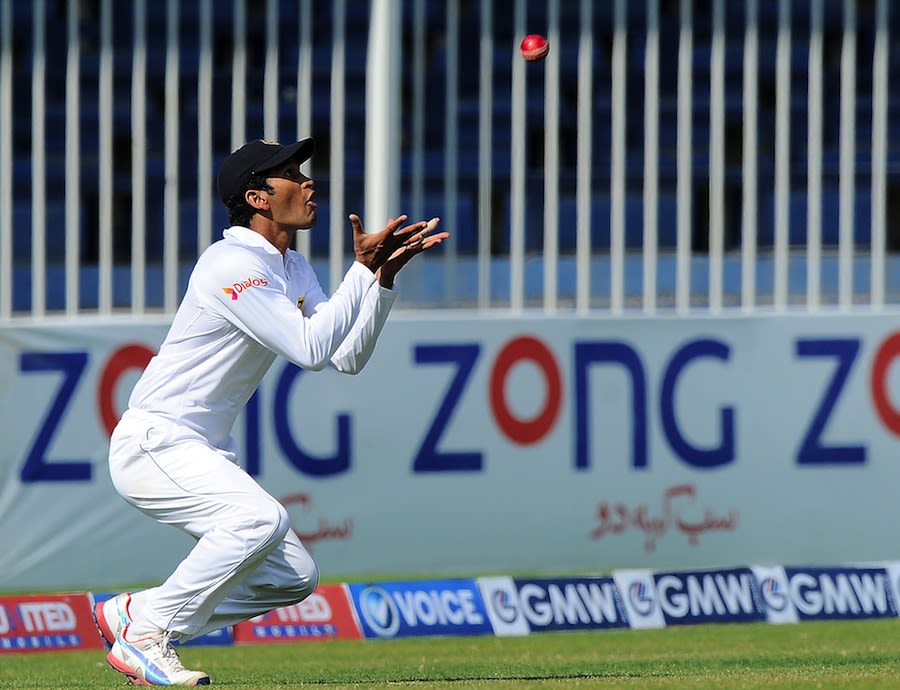 Dimuth Karunaratne prepares to catch the ball at deep square leg ...