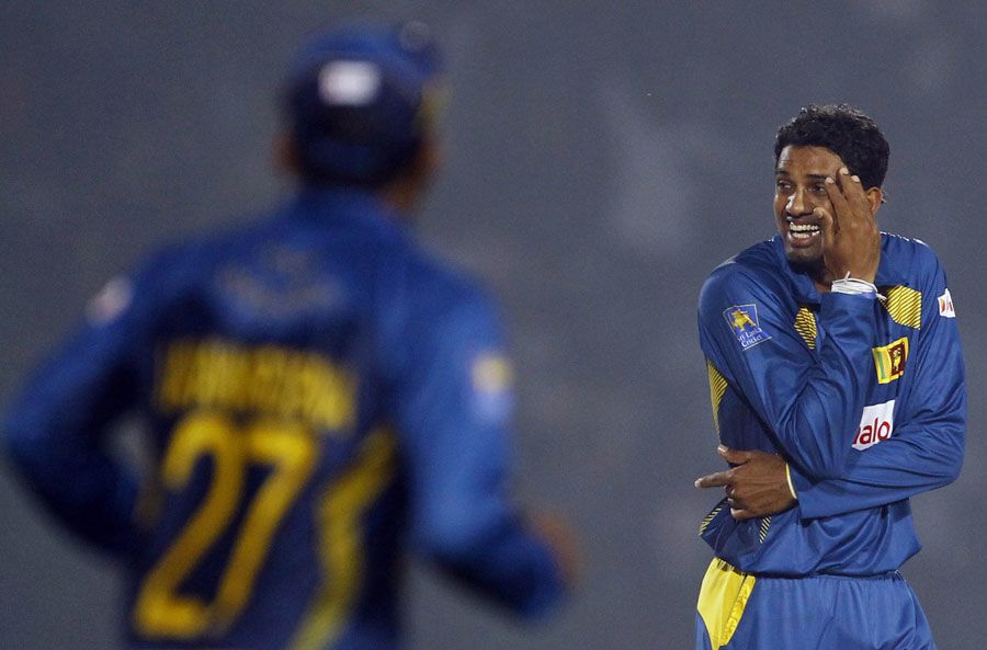 Sachithra Senanayake smiles after dismissing Sohaib Maqsood ...