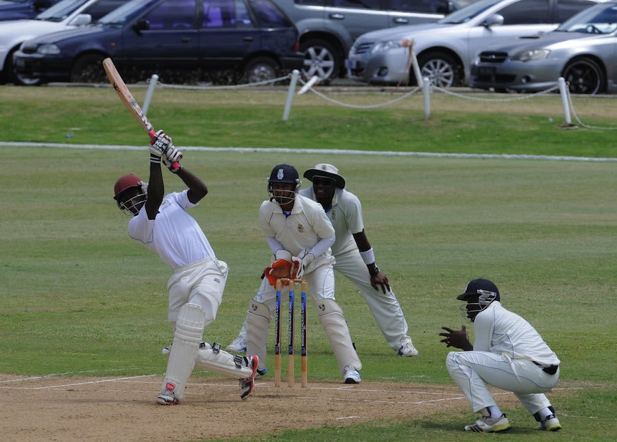 Kyle Corbin hits down the ground during his fifty | ESPNcricinfo.com