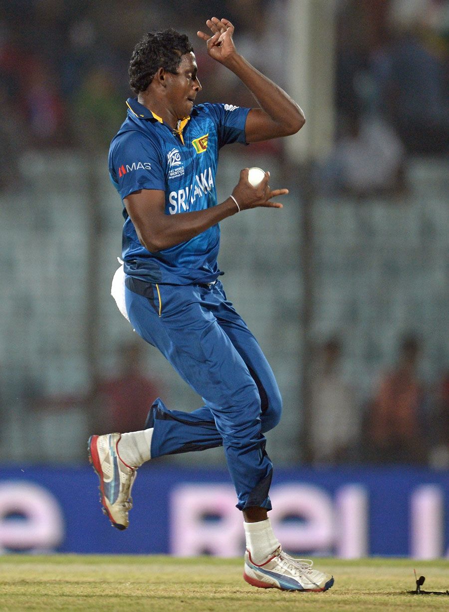 Ajantha Mendis in his delivery stride | ESPNcricinfo.com