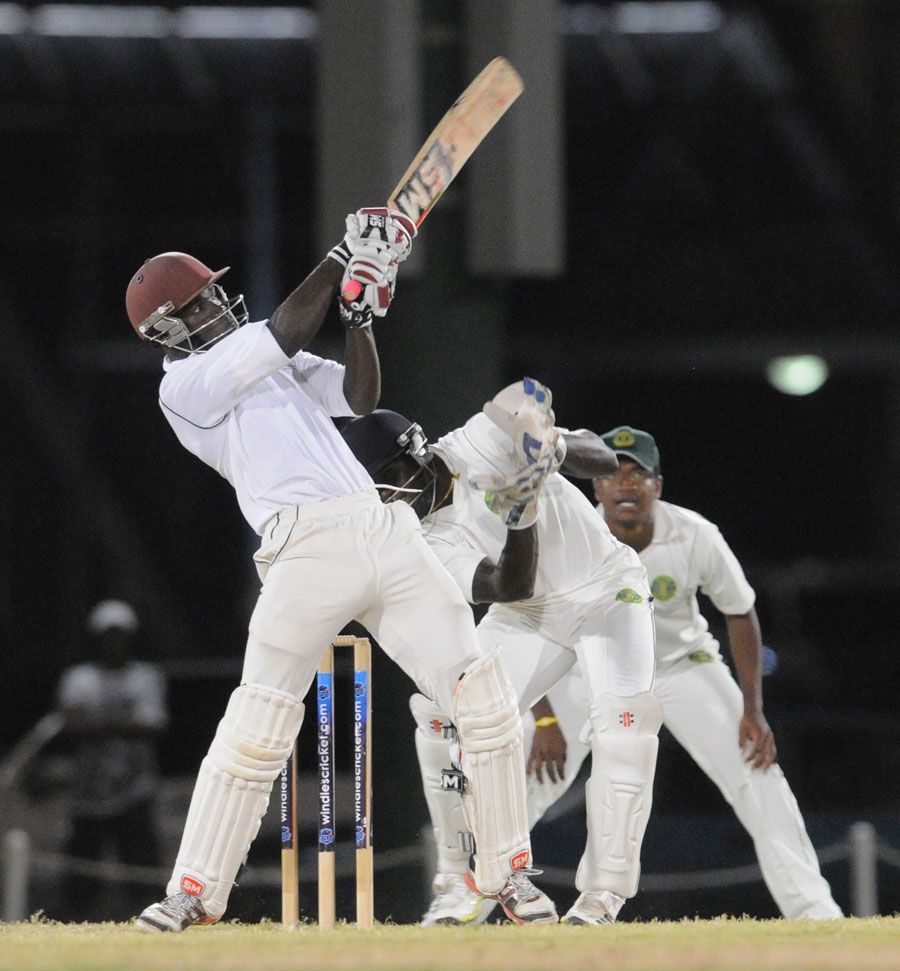Chadwick Walton belts one over midwicket durind his match-winning ton ...
