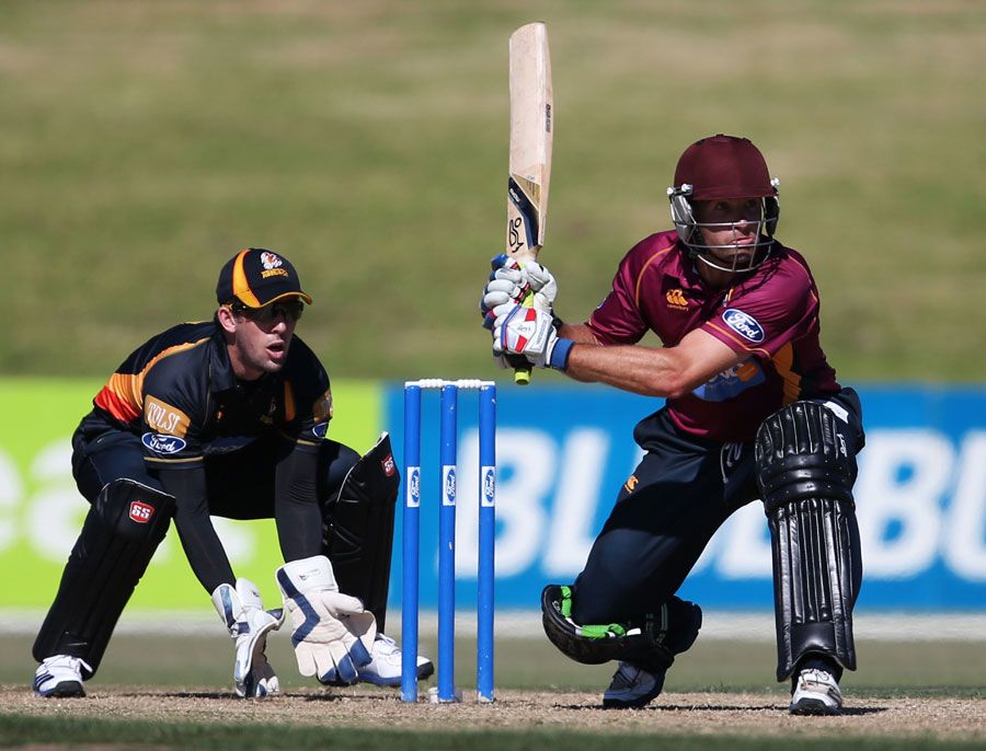 Brad Wilson gets ready to sweep during his 68 | ESPNcricinfo.com