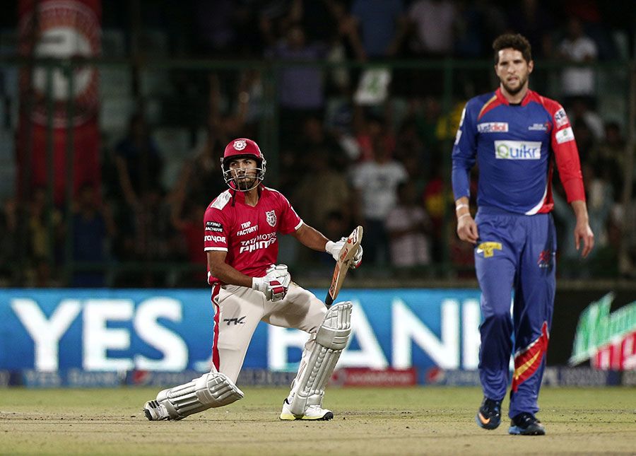 Rishi Dhawan celebrates after scoring the winning runs off Wayne ...