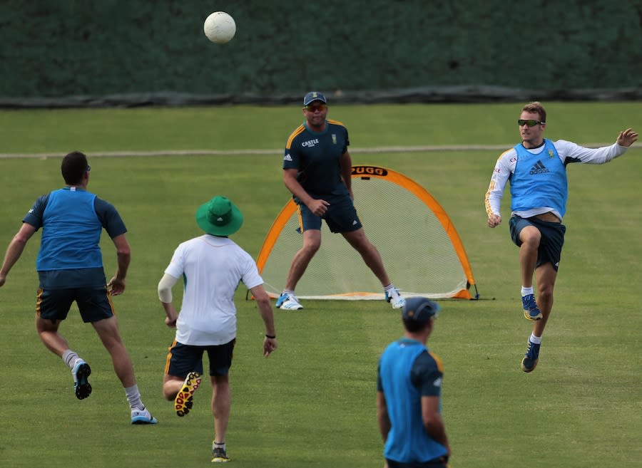 David Miller shows off his football skills during practice ...