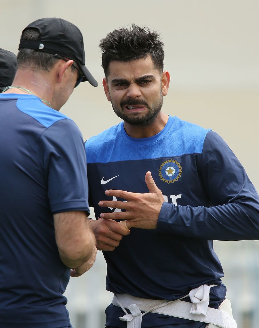Virat Kohli grimaces as he holds his finger | ESPNcricinfo.com