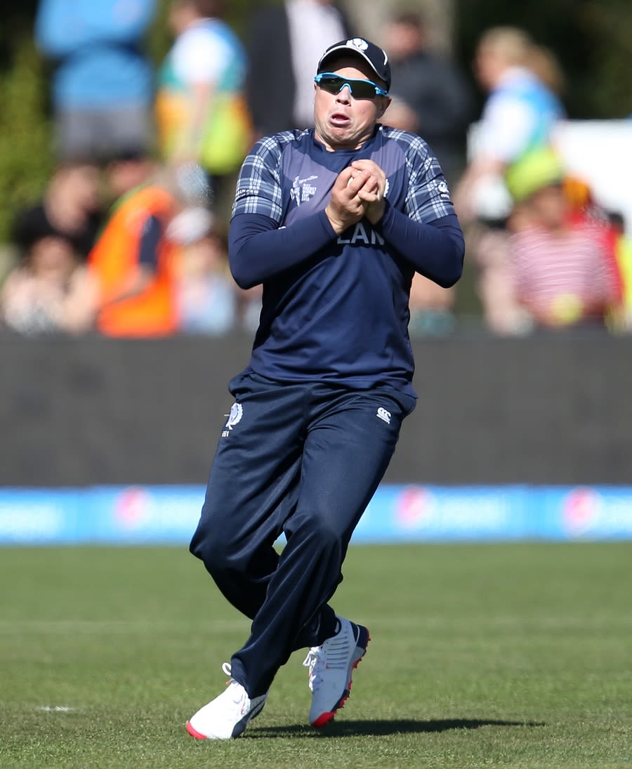 Matt Machan takes a catch to get rid of Javed Ahmadi for 51 ...