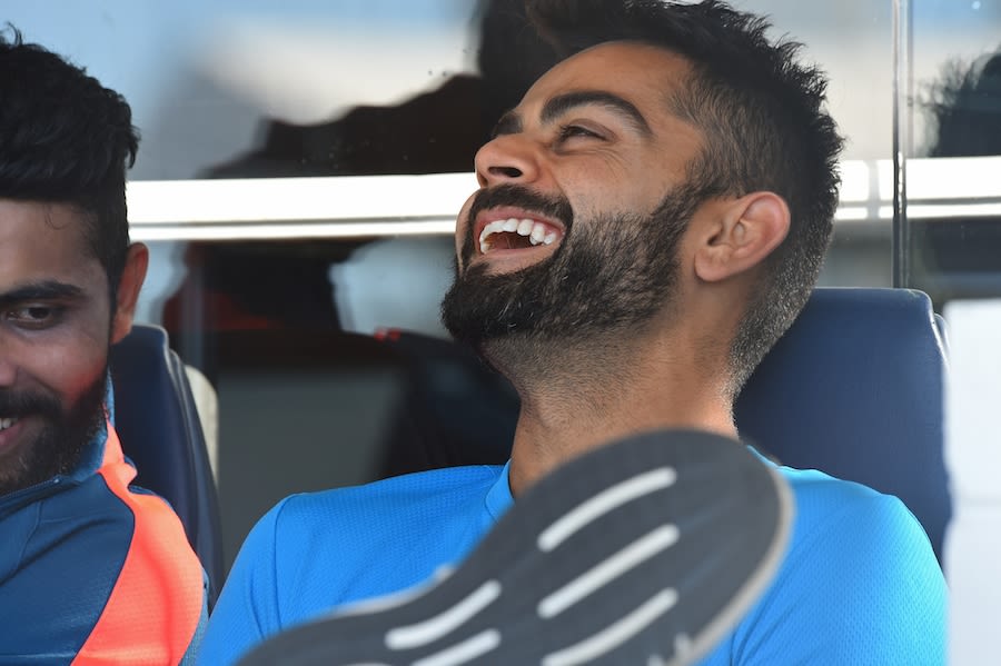 Virat Kohli has a laugh during a break | ESPNcricinfo.com