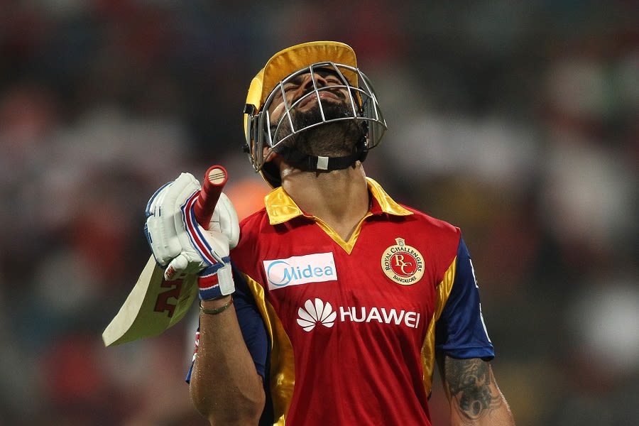 Virat Kohli is disappointed after being bowled by Ravi Bopara ...