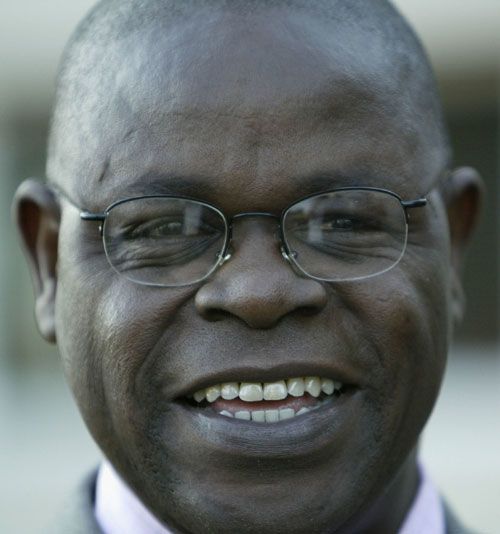 Peter Chingoka smiles while facing the media in Harare | ESPNcricinfo.com