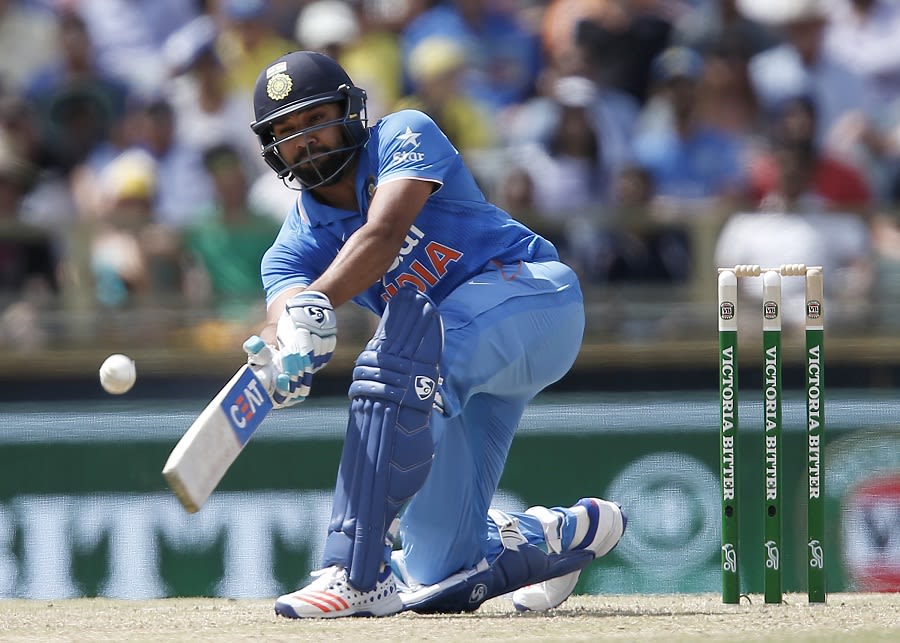 Rohit Sharma lines up to play a sweep during his 171* | ESPNcricinfo.com