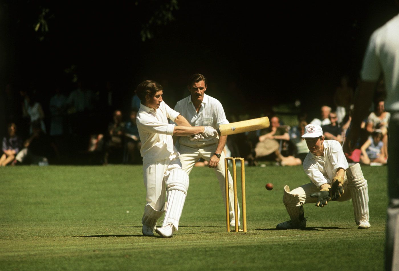 Prince Charles bats in a charity match with race car drivers Graham ...