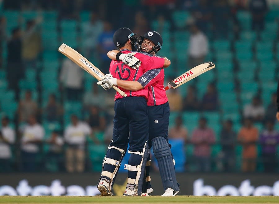 Kyle Coetzer and Matt Machan hug each other after sealing Scotland's ...