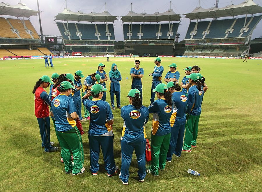 The Pakistan Women's team gather in a huddle before the start of their ...