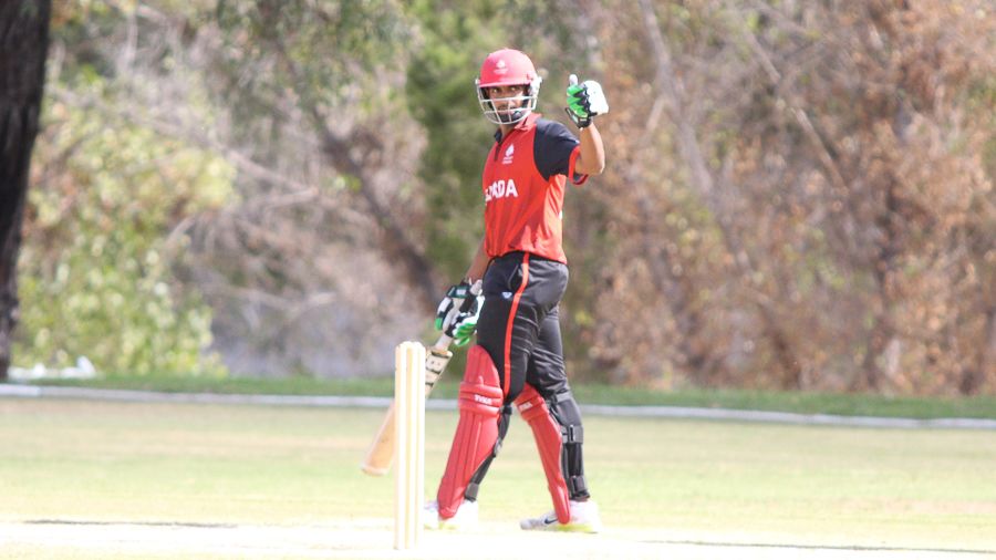 Nikhil Dutta gives a thumbs up upon reaching 50 | ESPNcricinfo.com