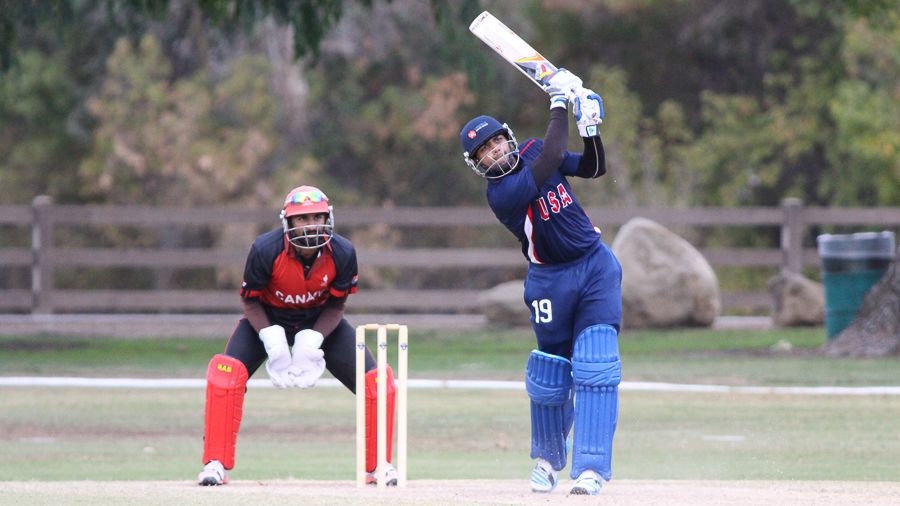 Ravi Timbawala lofts straight down the ground for one of his seven ... Ravi Timbawala lofts straight down the ground for one of his seven ...