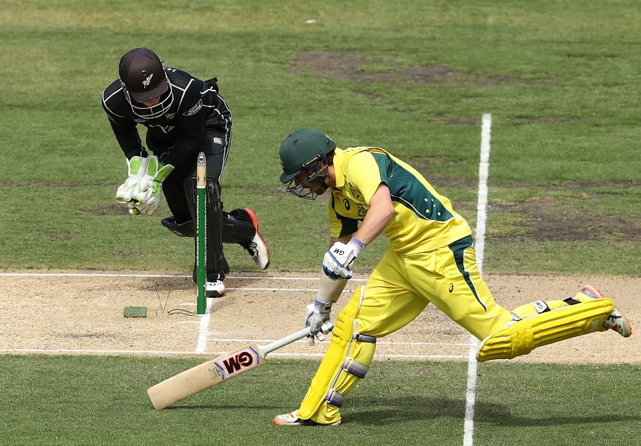 Travis Head scampers back to the crease even as BJ Watling prepares to ...