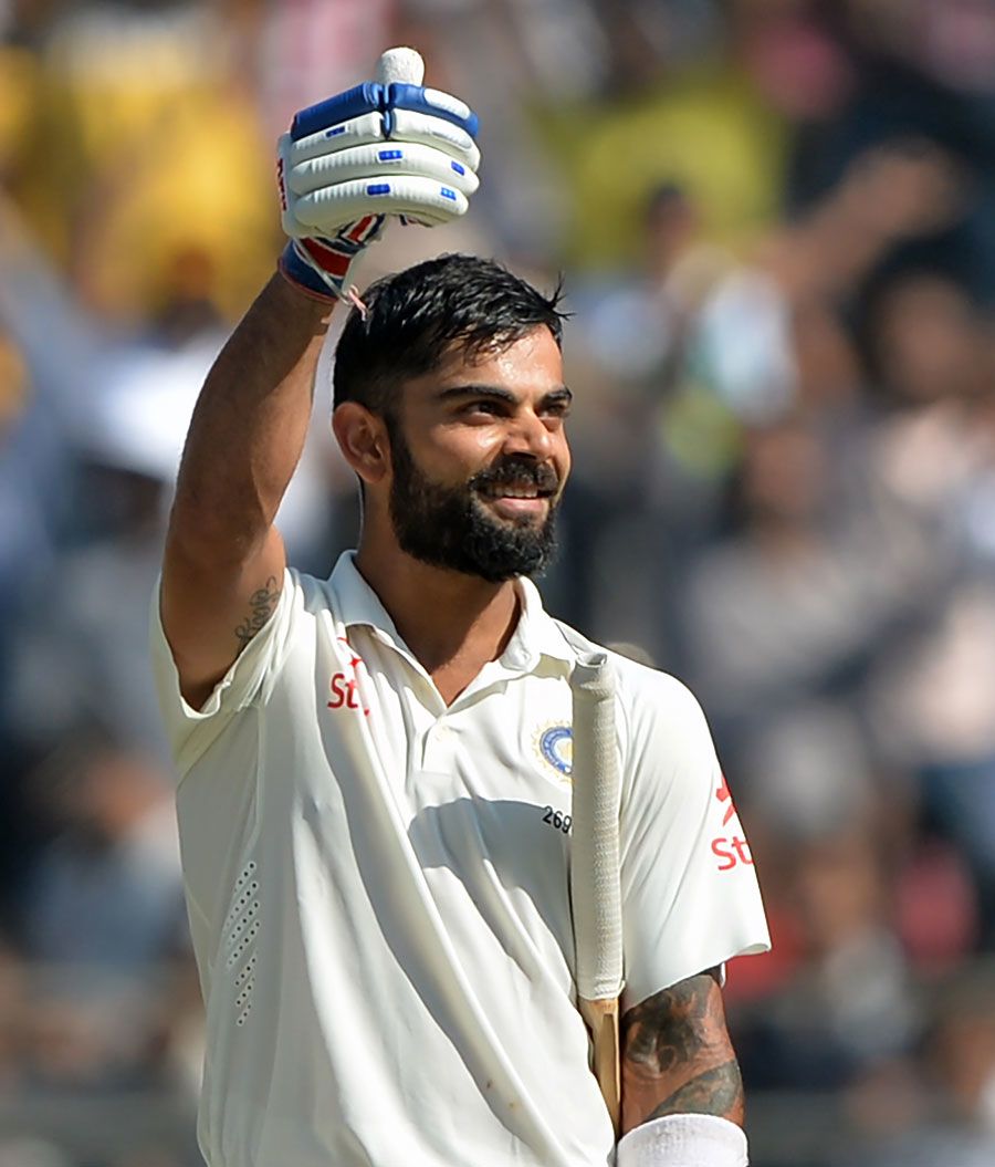 Thumbs up: Virat Kohli was all smiles on reaching his double ...