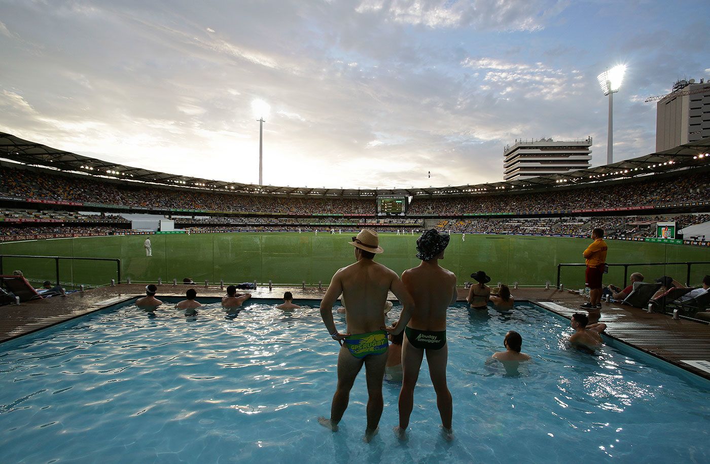 Australian fans stand in the pool set up in the Gabba stands ...