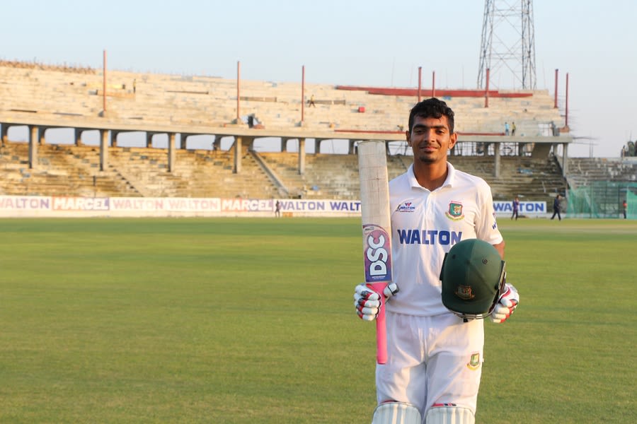 Saif Hassan poses at stumps after making 131 not out | ESPNcricinfo.com