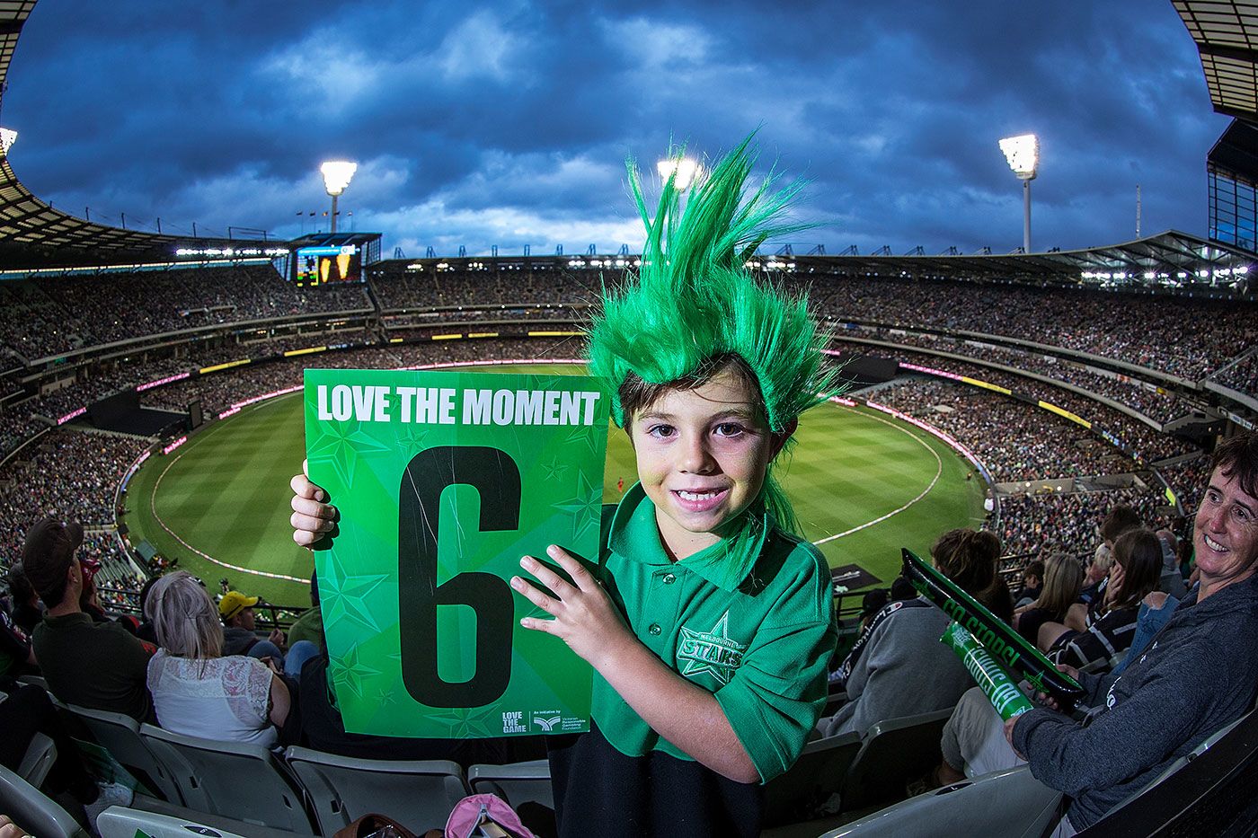 A young fan poses for a photograph | ESPNcricinfo.com