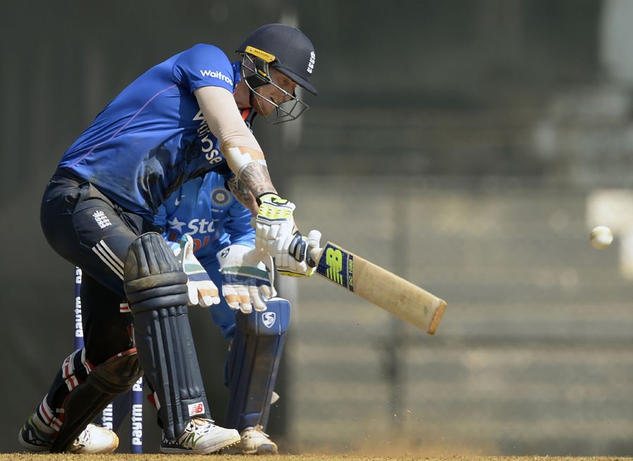 Ben Stokes frees his arms and slaps it through the off side ...