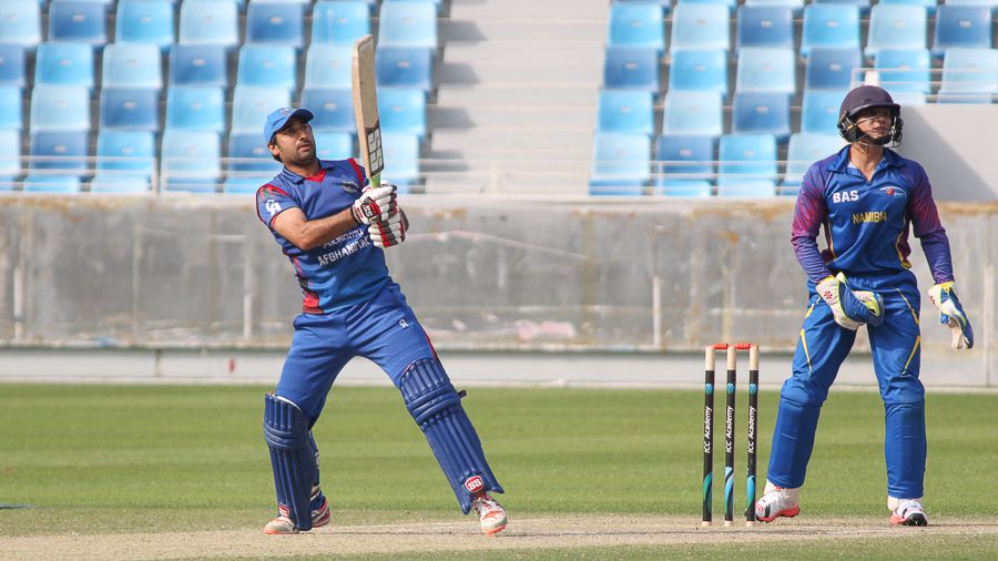Asghar Stanikzai clobbers a Colin Peake full toss for six ...