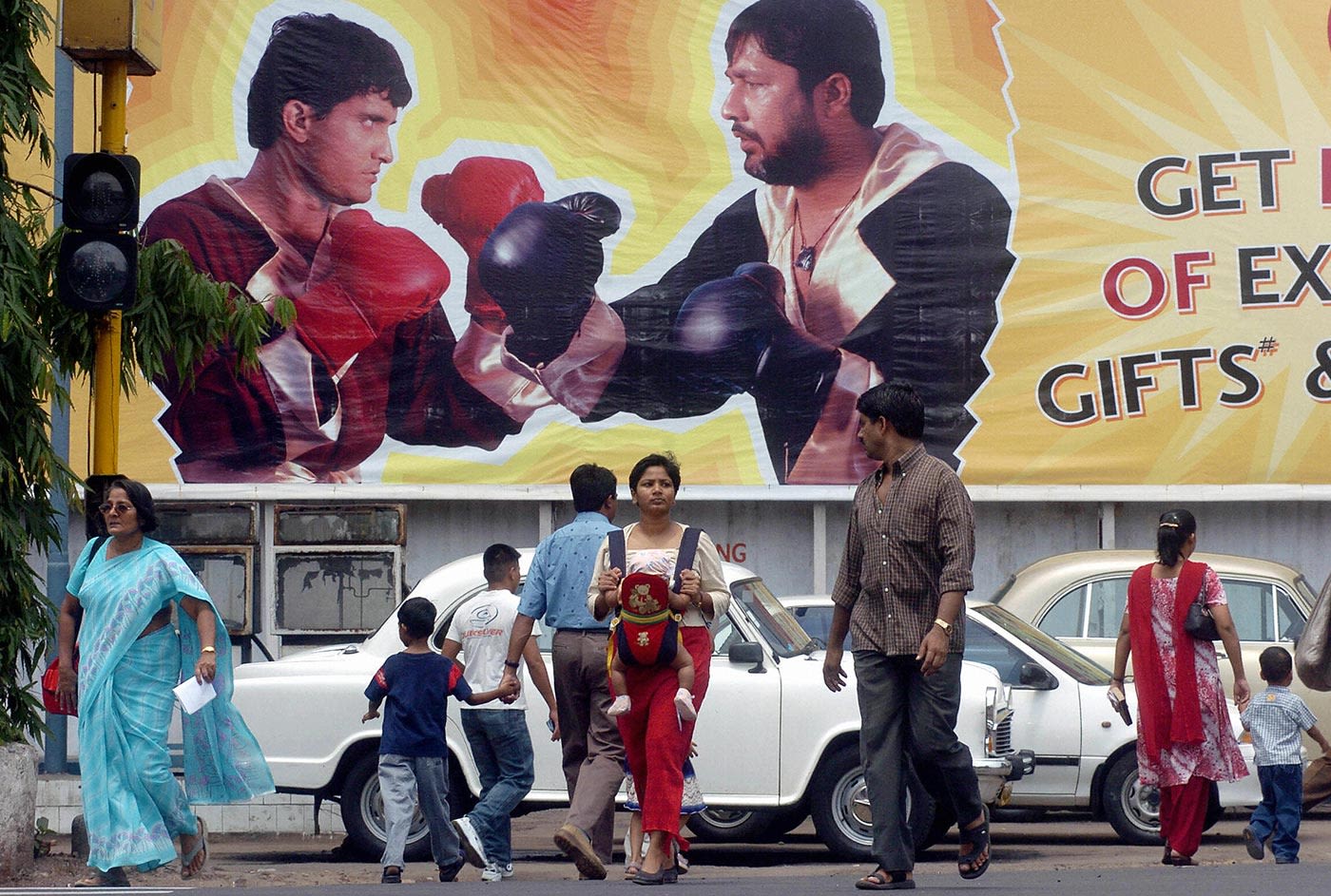 A billboard depicts Sourav Ganguly and Inzamam-ul-Haq facing off in a ...
