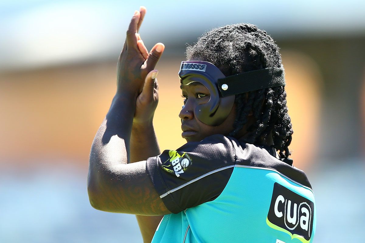 Deandra Dottin takes the field with a face guard after her cheekbone ...