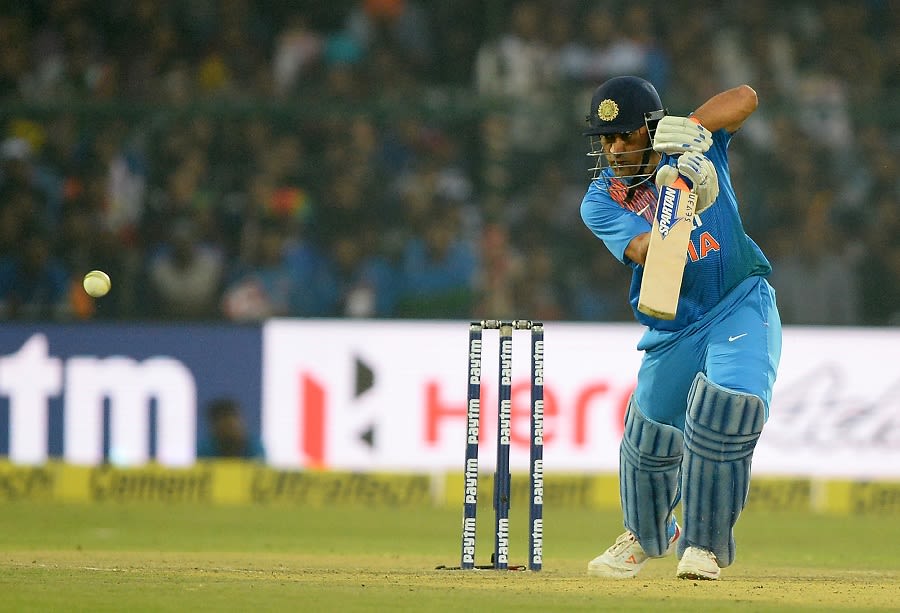 MS Dhoni punches the ball | ESPNcricinfo.com