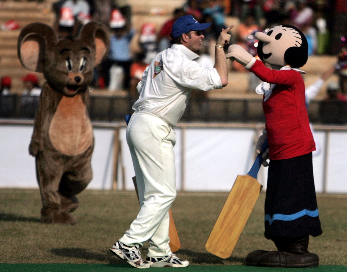 Mark Waugh has an argument with his batting partner Olive Oyl while ...