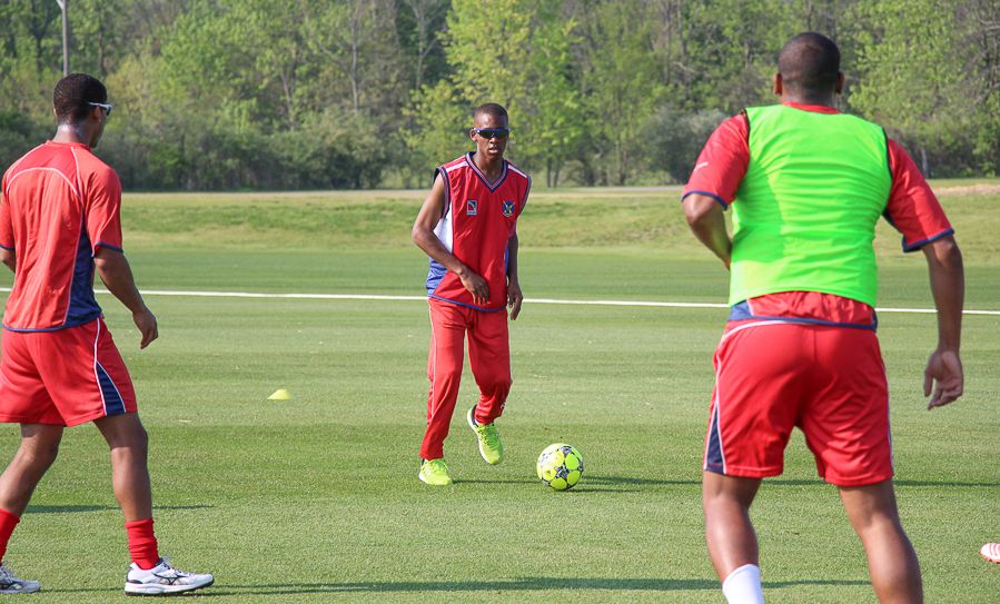 Delray Rawlins plays football during team warm-up | ESPNcricinfo.com