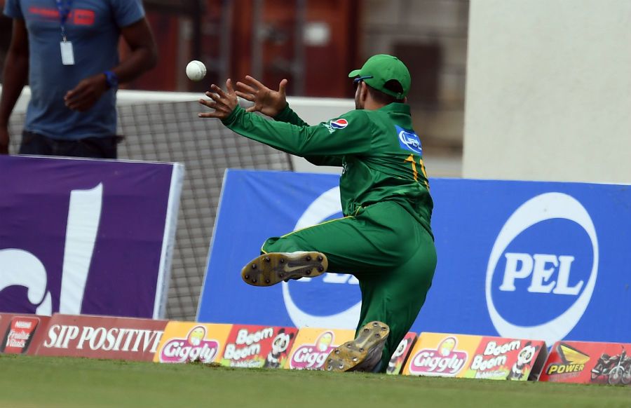 Ahmed Shehzad with an acrobatic stop at deep midwicket | ESPNcricinfo.com