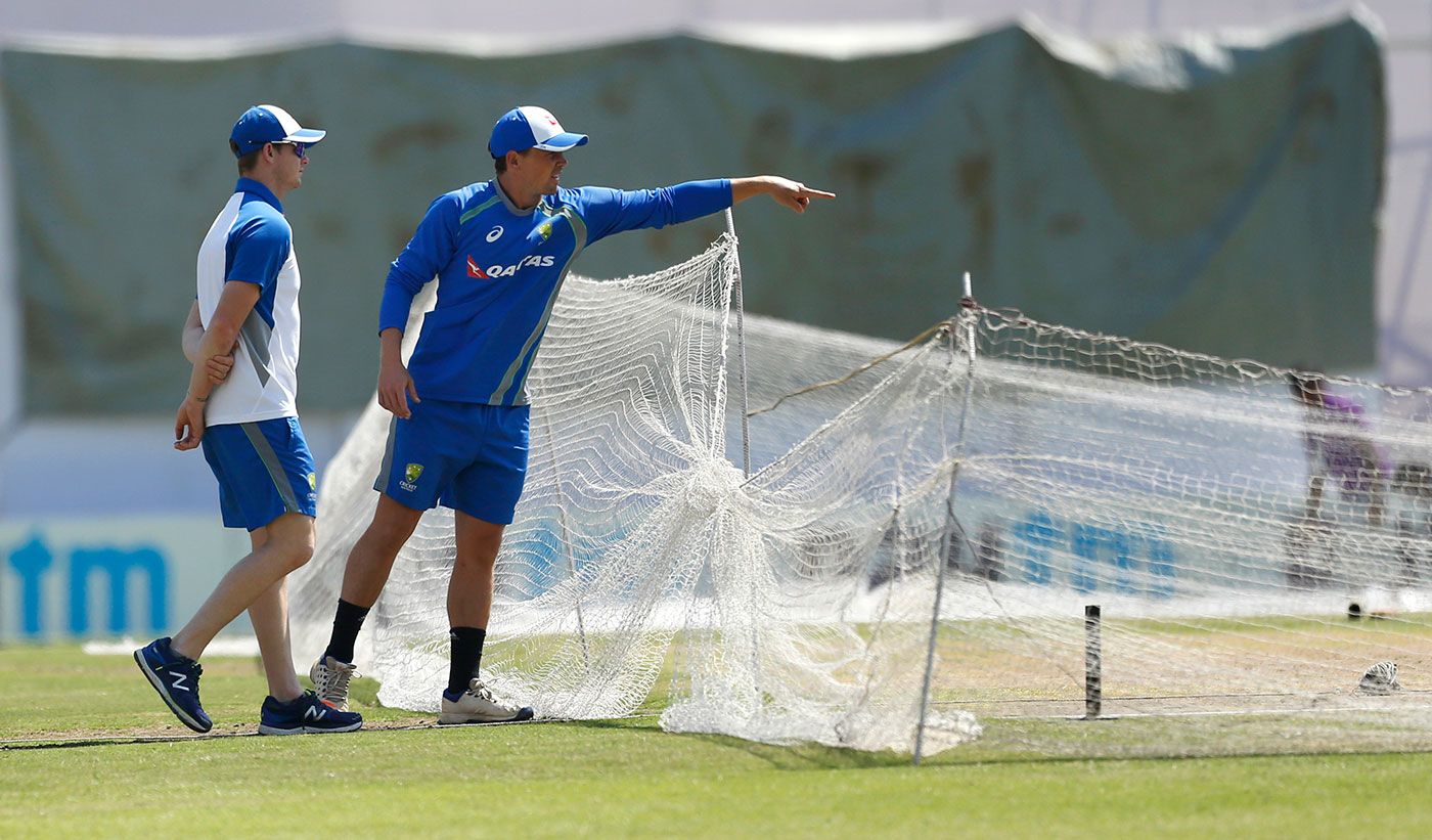 Steven Smith (left) and Steve O'Keefe inspect the Ranchi pitch ...
