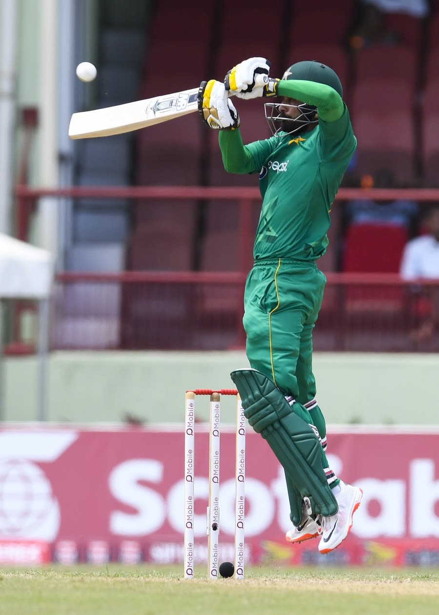 Mohammad Hafeez tiptoes to play a shot | ESPNcricinfo.com