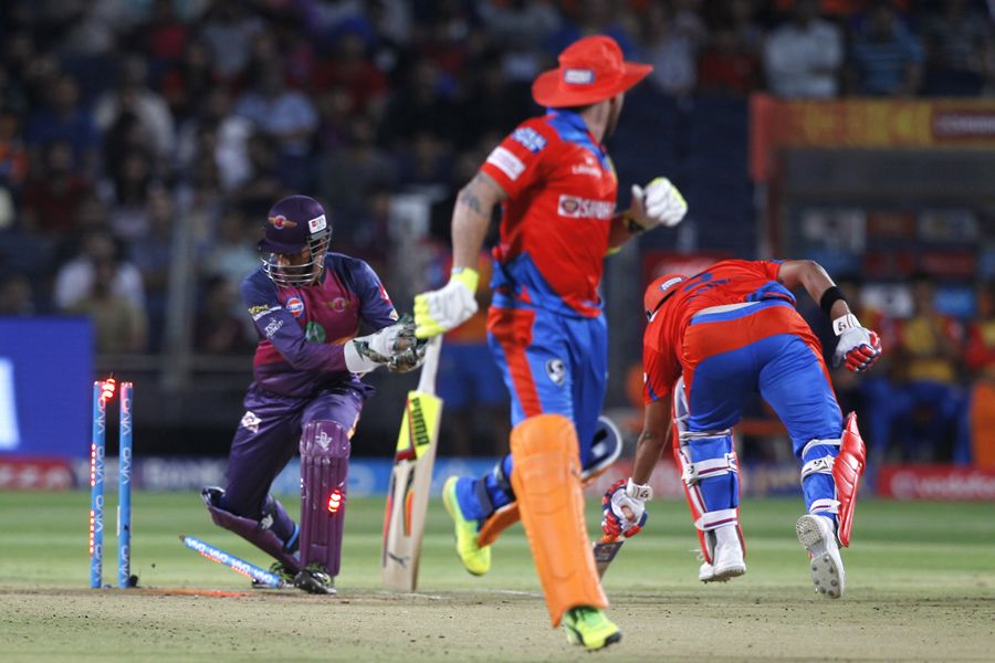MS Dhoni breaks the stumps to run out Suresh Raina | ESPNcricinfo.com