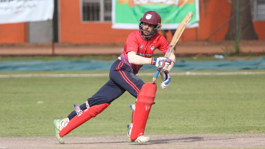 Arjun Mutreja guides the ball behind point during his century ...