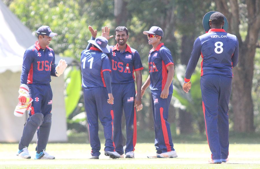 Mrunal Patel gets a high five after bowling Rizwan Cheema ...