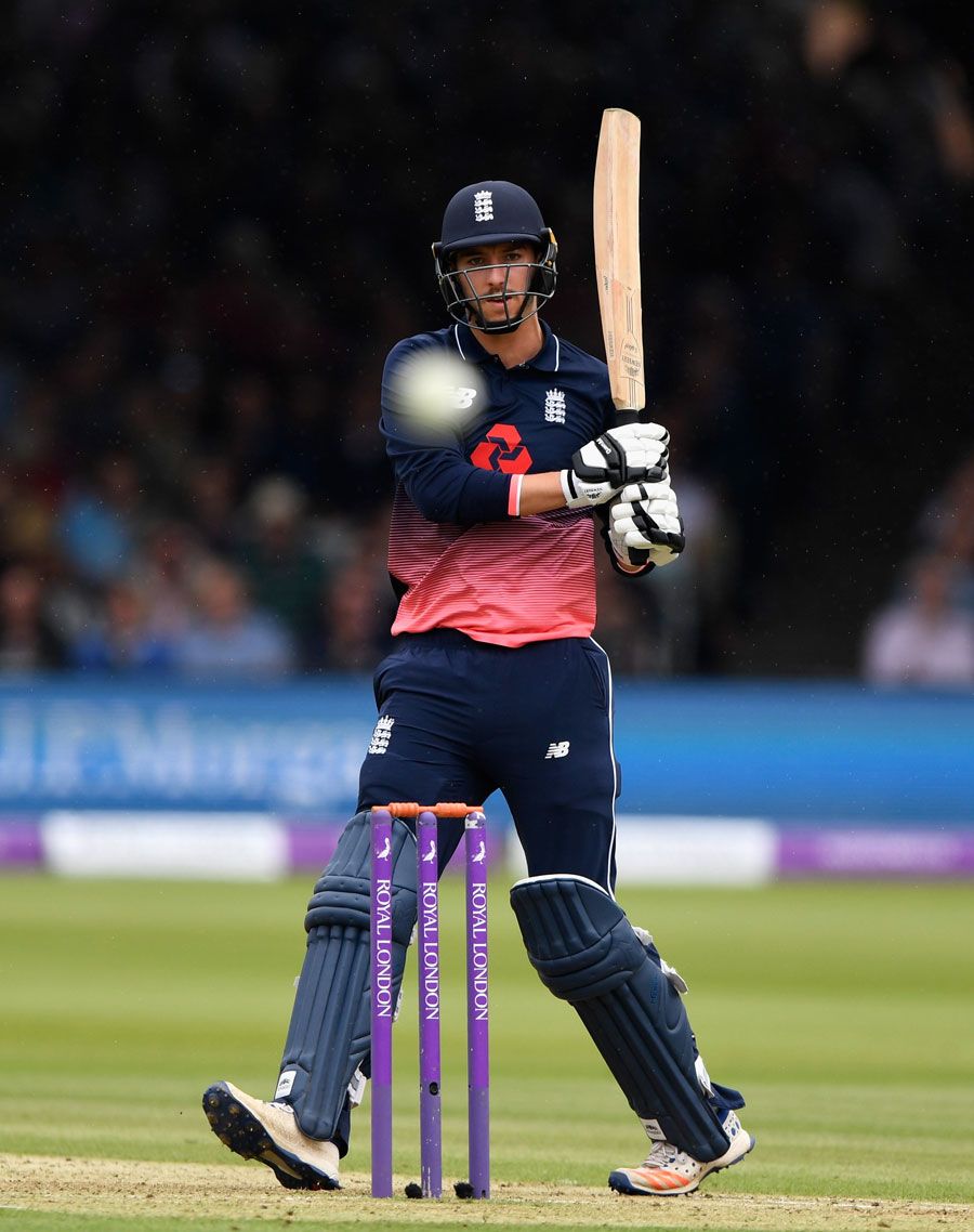 Spot the ball: Toby Roland-Jones pulls during his unbeaten 37 ...