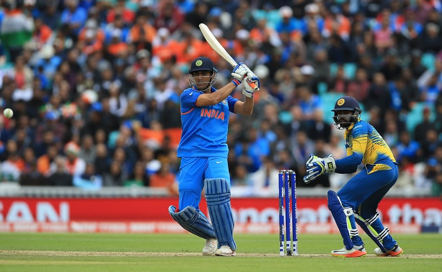 MS Dhoni struck a fifty to help India finish off on a high ...