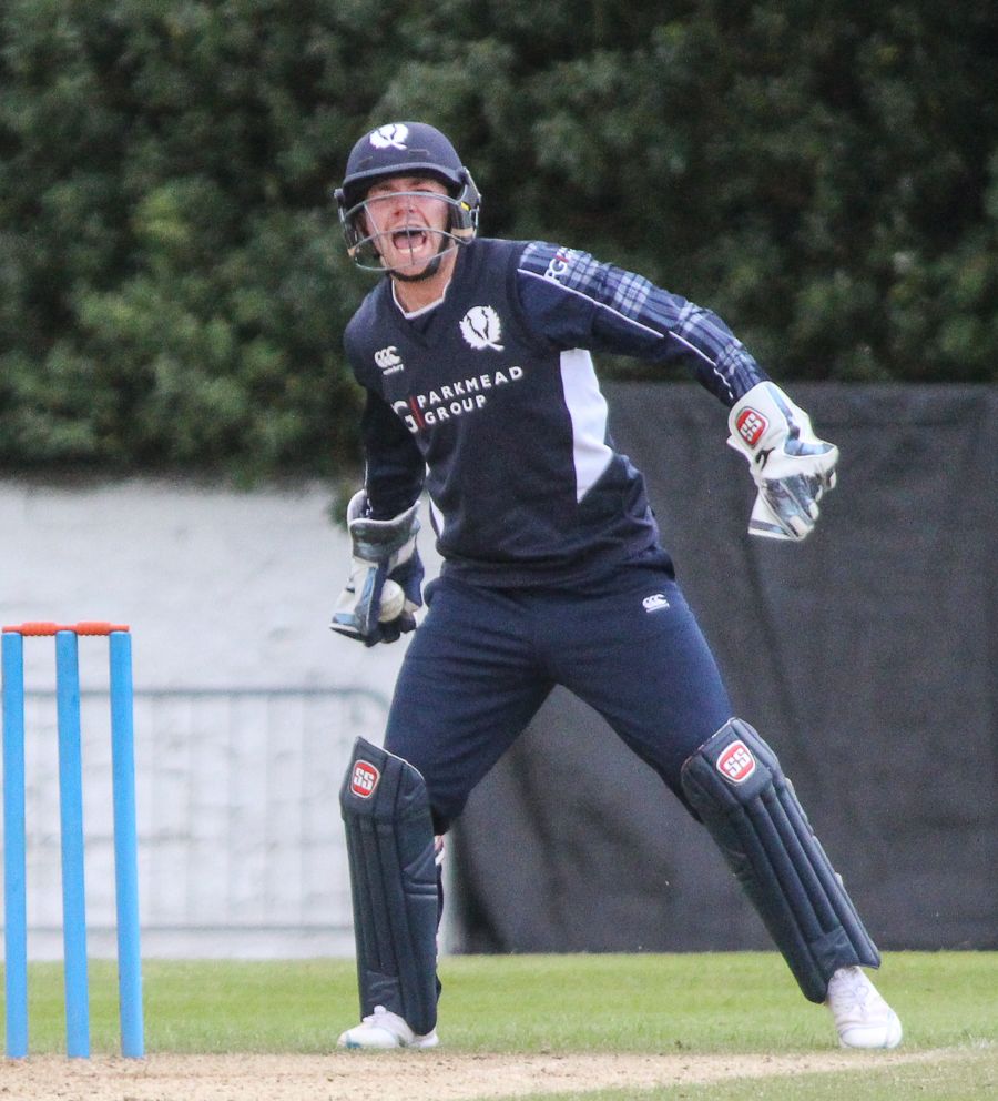 Matthew Cross celebrates after taking a sharp catch standing up to the ...