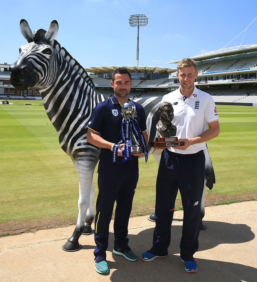 Joe Root and Dean Elgar with the series trophies (and a zebra ...
