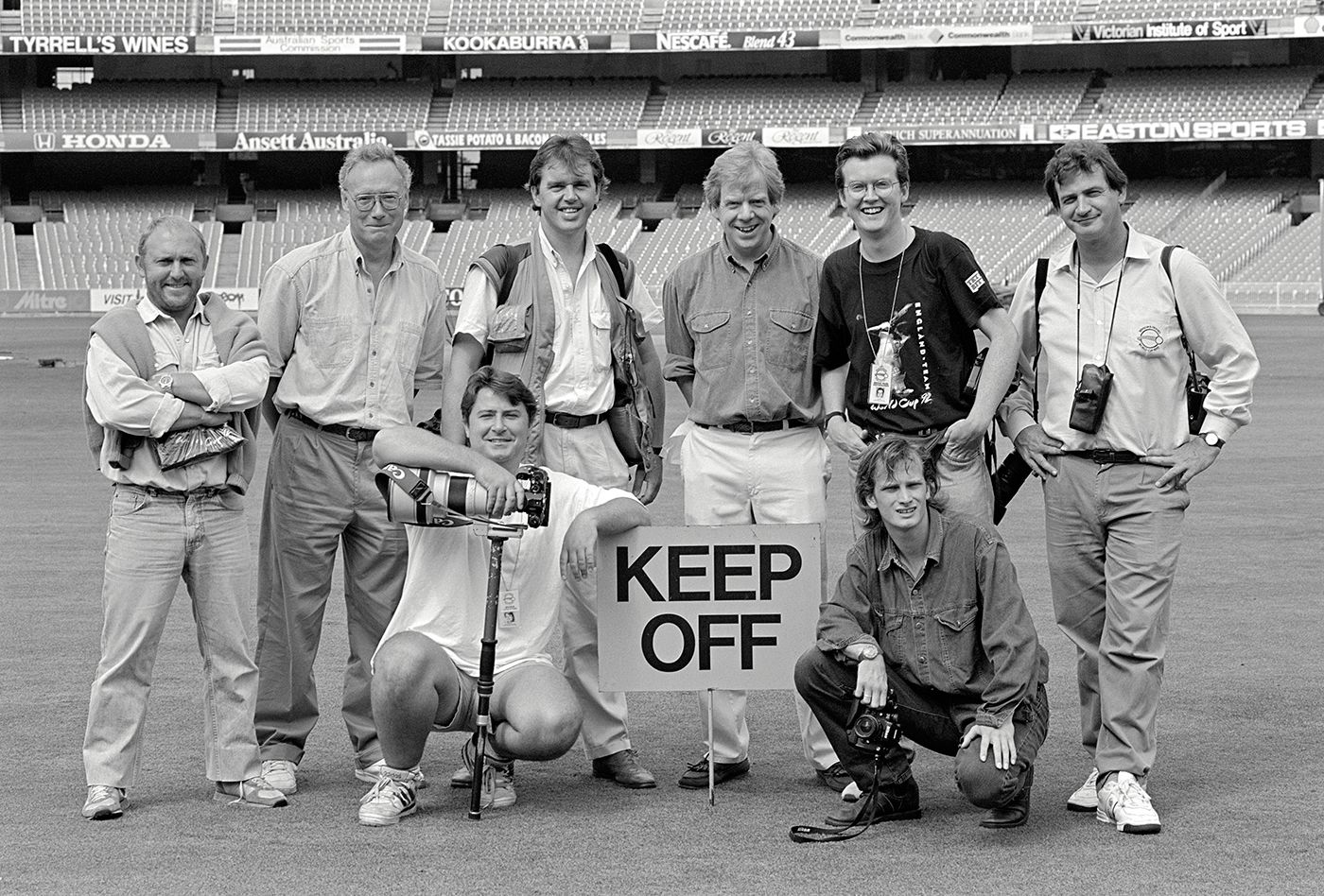 Cricket photographers (standing, from left) Joe Mann, Patrick Eagar ...