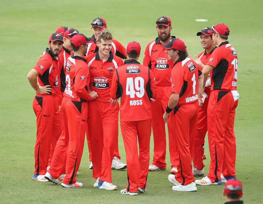 Nick Winter celebrates the wicket of Max Bryant with his team-mates ...