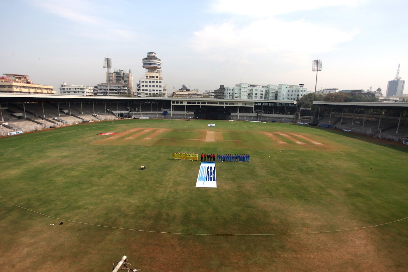 A view of the Brabourne Stadium with the two teams lined up ...