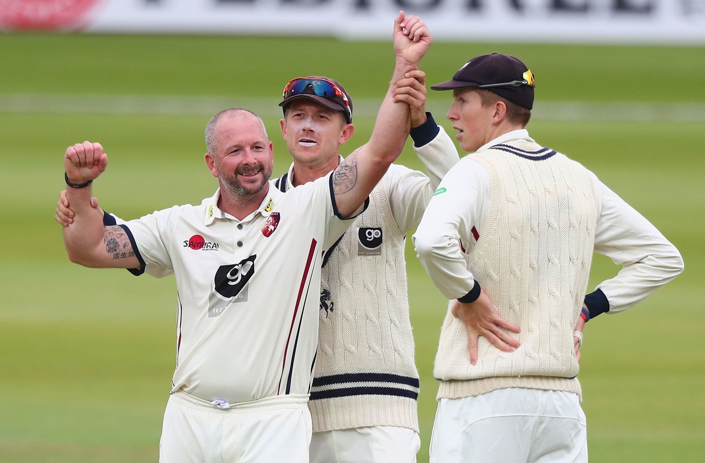 Darren Stevens celebrates with Joe Denly and Zak Crawley | ESPNcricinfo.com